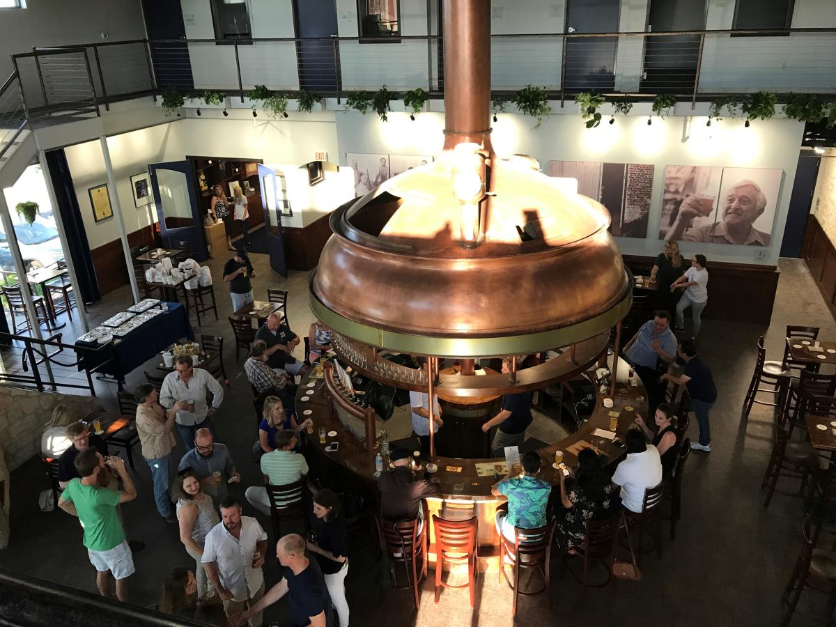 a bar in an old brewing kettle : r/DesignPorn