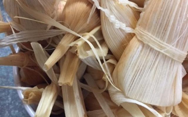 rolling tamales