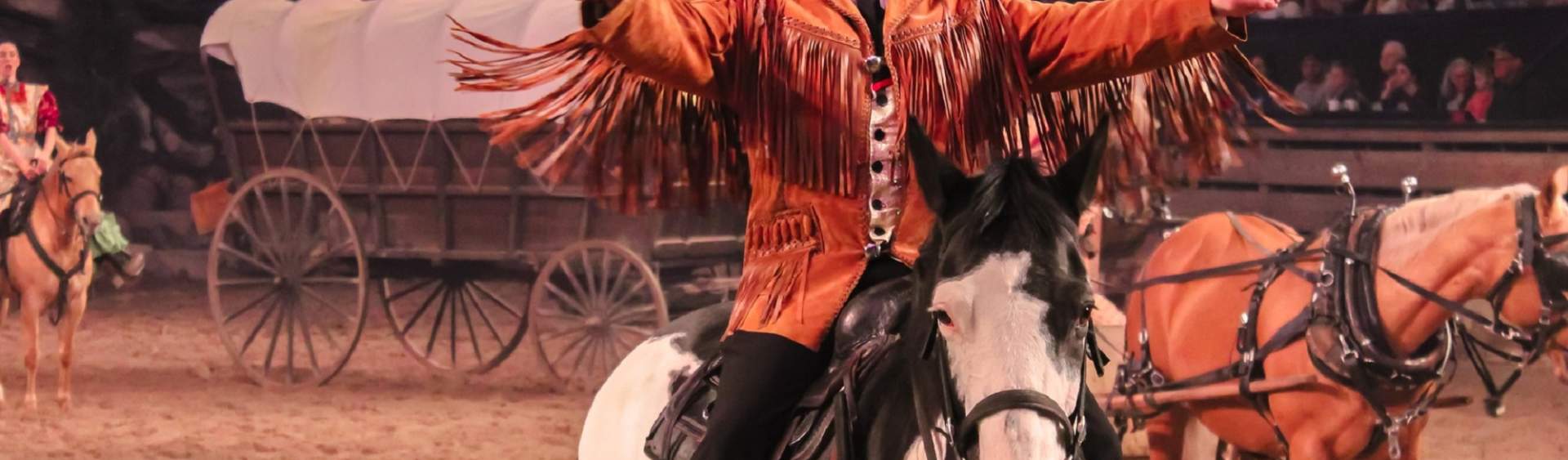 dolly parton riding a dinosaur