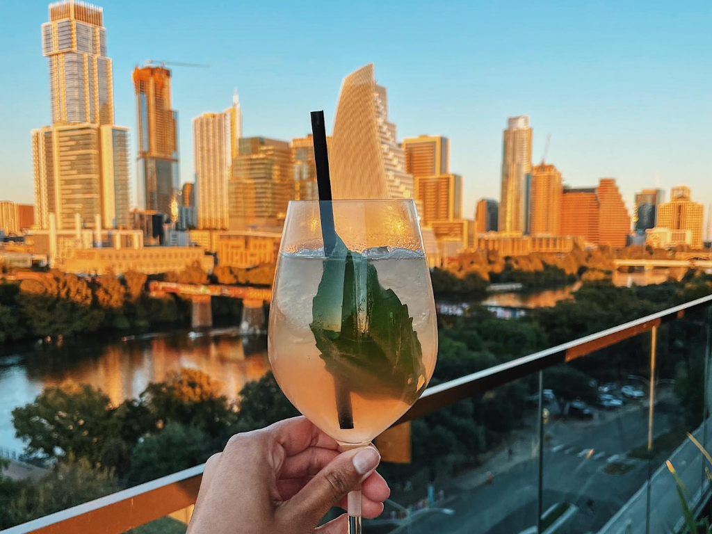 The Best Rooftop Restaurants + Bars to Catch Golden Hour in Austin