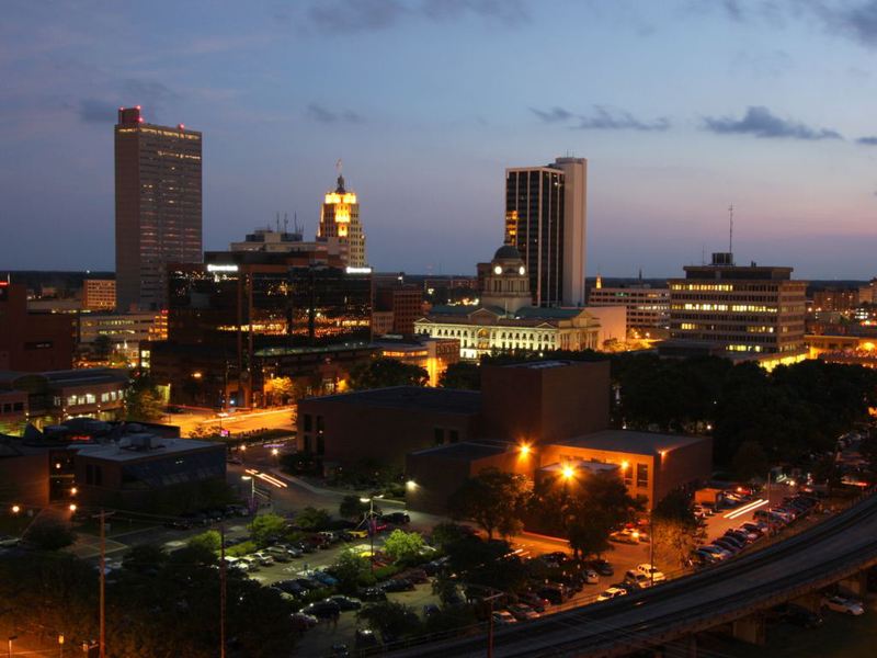 Fort Wayne Skyline At Night Aerial Pan Across Downtown Fort Wayne
